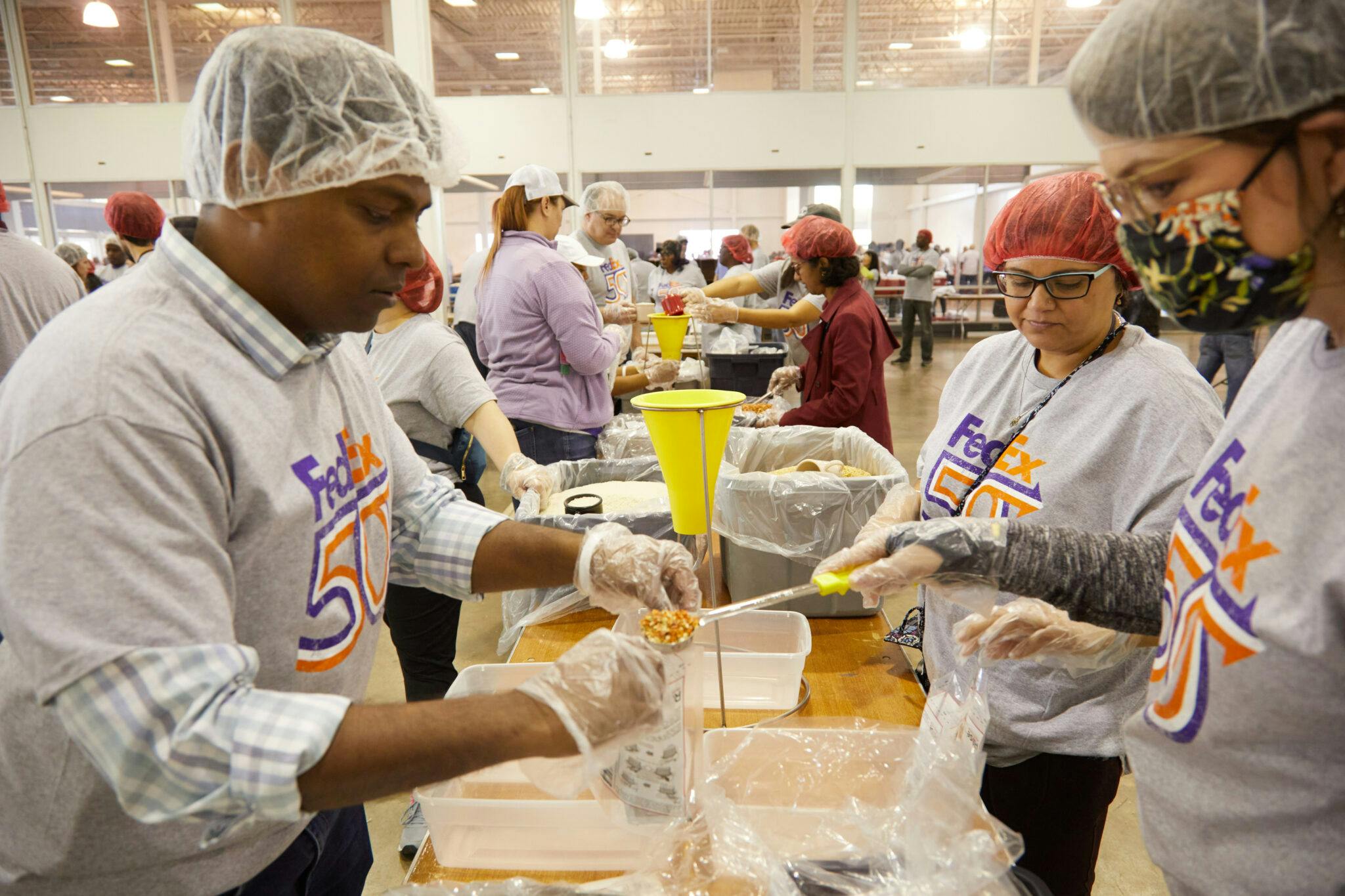 FedEx Celebrates 50th Birthday by Packaging 50,000 Meals - Rise Against ...